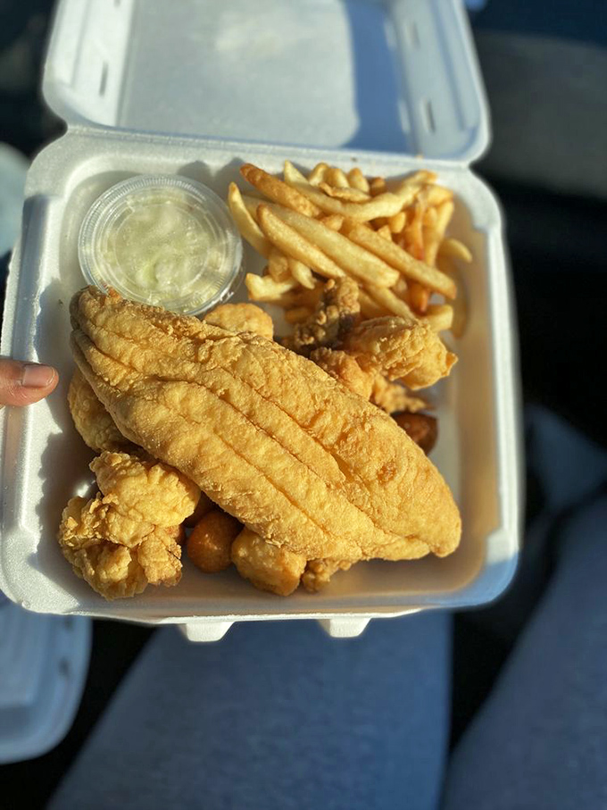 This to-go container holds the holy grail of fried flounder&mdash;crispy exterior giving way to flaky white fish that tastes like vacation.