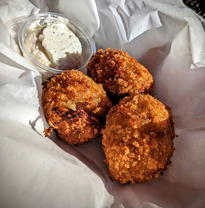 These golden-fried mushrooms with their crispy coating and creamy dipping sauce prove that sometimes the simplest appetizers deliver the most profound satisfaction.