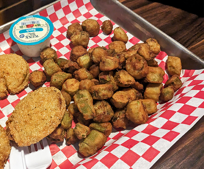 Fried okra and cornbread pucks &ndash; the supporting actors that deserve their own standing ovation in this BBQ drama.