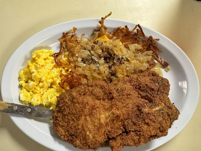A proper Southern fried pork chop doesn't need fancy garnishes&mdash;just a plate big enough to contain its magnificence.