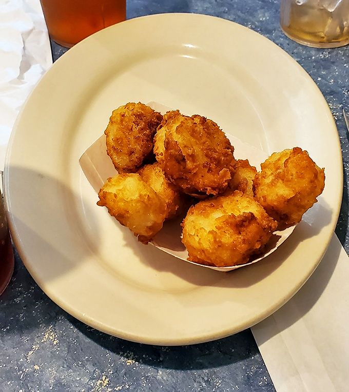 Fried scallops that taste like sweet little treasures from Neptune's personal collection. Worth driving across state lines for these alone.