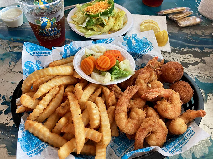 Crispy shrimp that snap between your teeth, fries with just the right crinkle. The vegetables? A noble attempt at virtue.