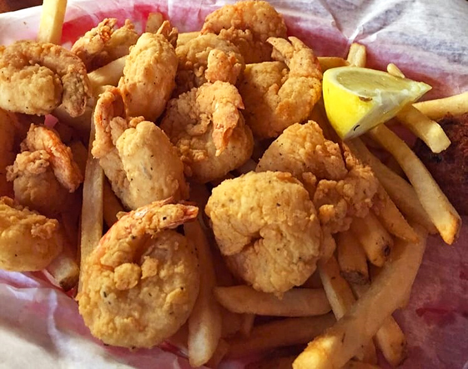 These golden-battered shrimp aren't just fried, they're elevated to art form &ndash; crispy treasures that snap between your teeth.