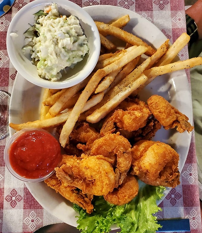 Golden-fried shrimp that snap with freshness, paired with fries that somehow manage to be both crispy outside and fluffy inside.