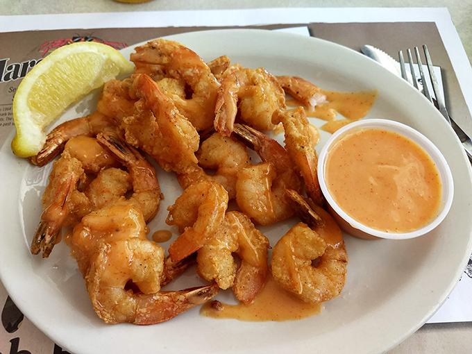 The legendary fried shrimp &ndash; perfectly golden, impeccably crisp, served with a sauce that makes you wonder why you'd eat shrimp any other way.