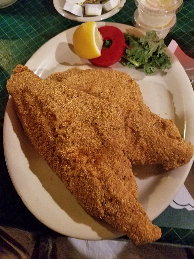 Catfish that tastes like it was swimming this morning, wearing a golden crust that crackles with each bite. Lemon optional, satisfaction guaranteed.