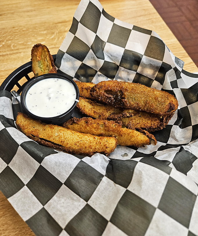 Golden-brown fried pickles that deliver that perfect crunch-to-tang ratio. The ranch dipping sauce isn't optional—it's essential to the experience.