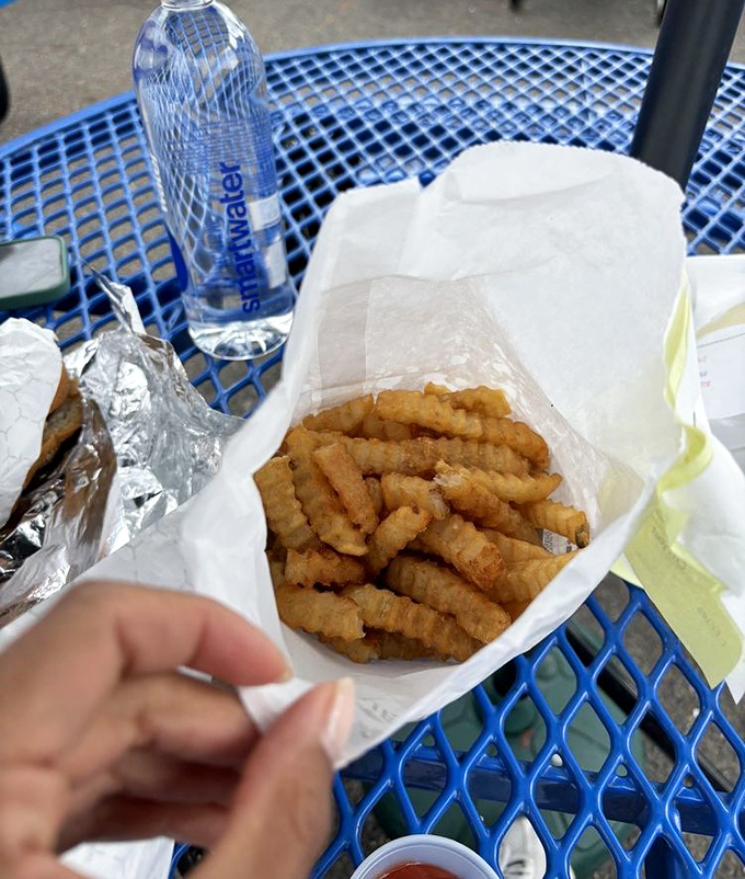 French fries so perfectly golden and crisp, they make you wonder why anyone would ever bother with those fancy truffle versions elsewhere.