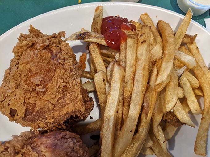 Hand-cut fries that put fast food chains to shame, with that perfect balance of crispy exterior and fluffy interior. The ketchup is just a formality.