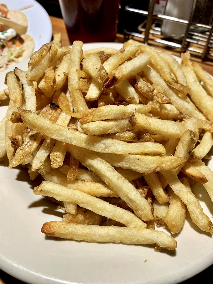 These aren't just fries—they're supporting actors who deserve their own Oscar. Crispy, golden, hand-cut perfection that refuses to be overshadowed.