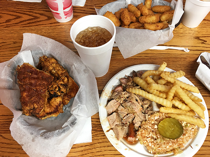 A barbecue plate that tells North Carolina's story better than any history book. The crispy fries and tangy slaw create the perfect supporting cast.