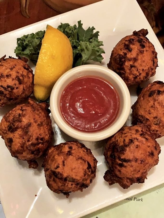 Conch fritters &ndash; golden orbs of Florida Keys tradition. Crispy outside, tender inside, and worth every calorie-laden bite.