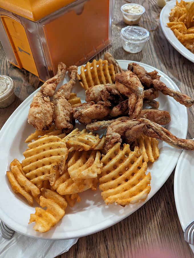 Crispy frog legs and waffle fries&mdash;proof that sometimes the most unexpected menu items become the conversation starters you can't stop talking about.