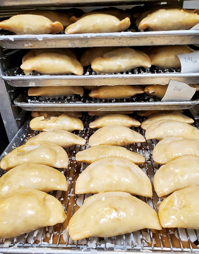 These aren't just pastries—they're golden-crusted pockets of joy waiting their turn to make someone's day. Grandma's recipes never looked so tempting.