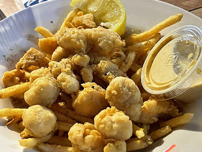 Golden-fried bay scallops and fries&mdash;proof that sometimes the simplest preparations let the sweetness of fresh seafood shine brightest.