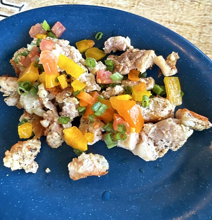 Colorful and vibrant, this seafood dish proves that eating with your eyes first is definitely a thing. Those peppers add both color and kick.