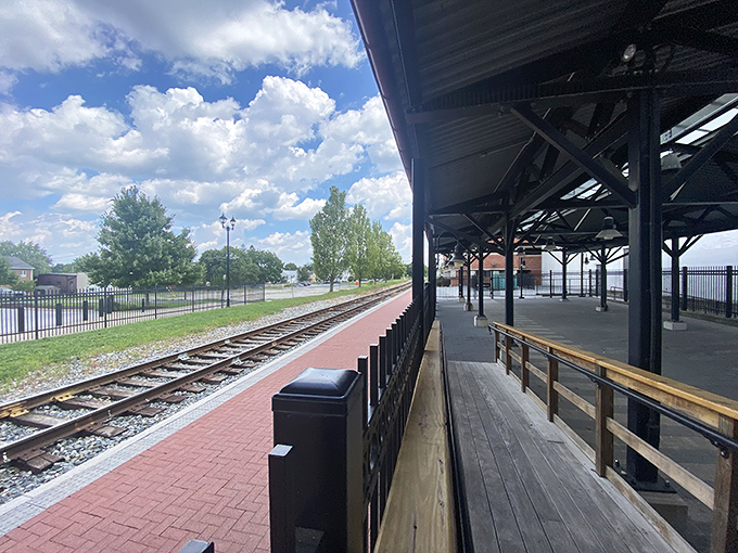 The old railroad station platform where you can almost hear the whistle of trains from a bygone era.