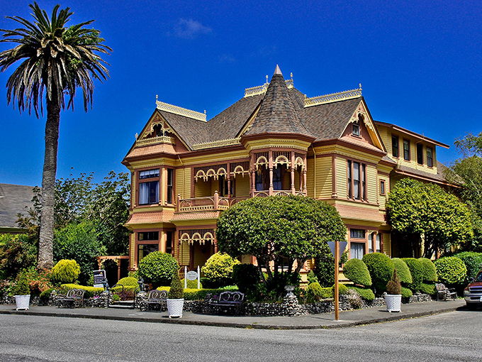 The Gingerbread Mansion isn't just showing off&mdash;though with that mustard-yellow paint and white trim, it absolutely could.