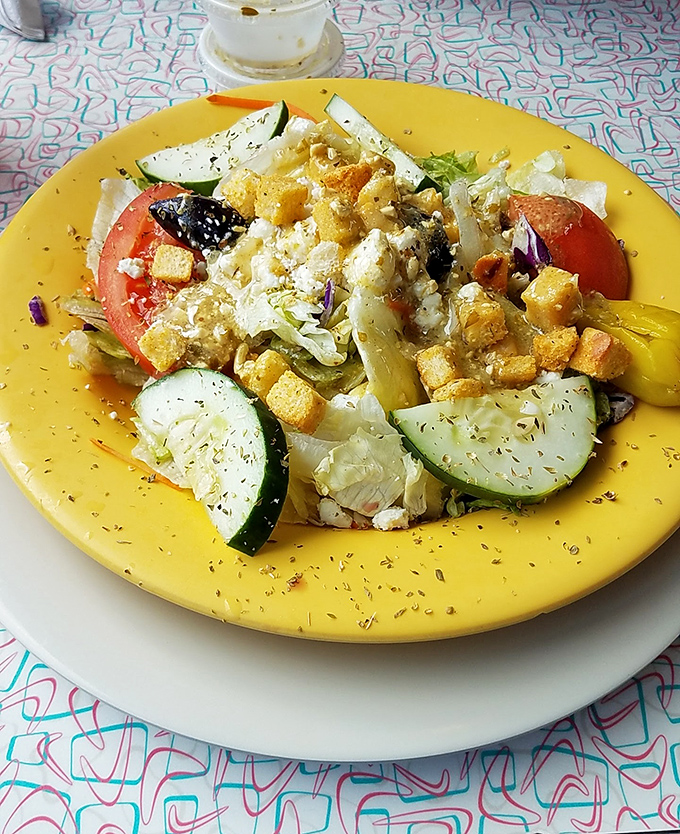 Even the salads here mean business. Crisp vegetables, golden croutons, and enough feta to remind you that healthy choices can still be indulgent choices.