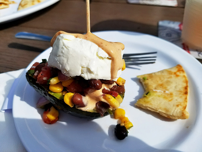 Avocado elevated to art form &ndash; grilled and topped with enough goodies to make you forget you're eating something healthy.