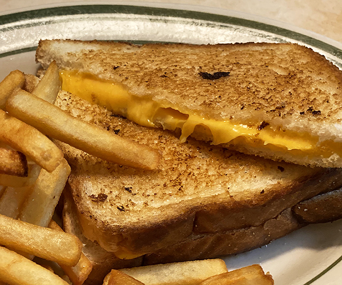 The humble grilled cheese elevated to art form&mdash;golden, crispy exterior giving way to that perfect cheese pull that dreams are made of.