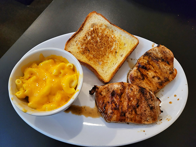 When mac and cheese glows with that perfect amber hue next to grilled chicken, you know someone in the kitchen actually cares.
