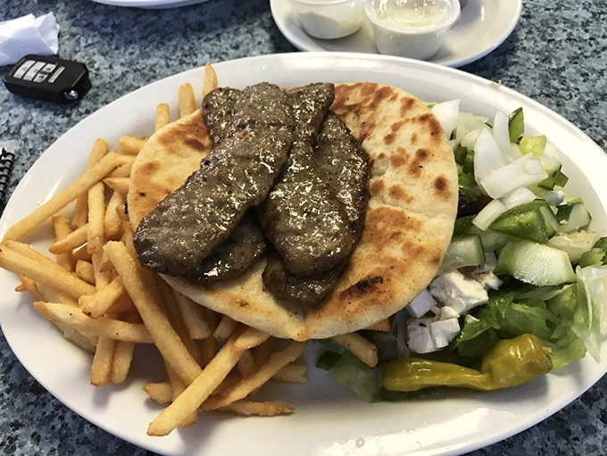 The gyro platter brings Mediterranean flair to the Keys, proving that good food knows no geographical boundaries&mdash;especially when served with crispy fries.