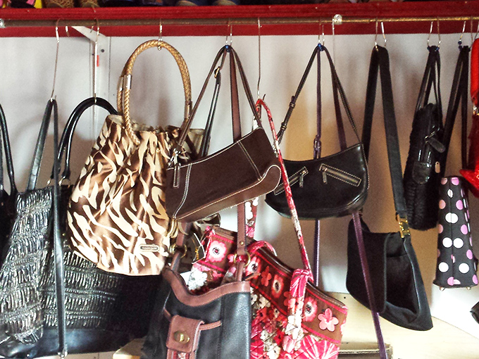 Handbag heaven where vintage purses and contemporary carryalls hang like fashionable fruit, ripe for the picking.
