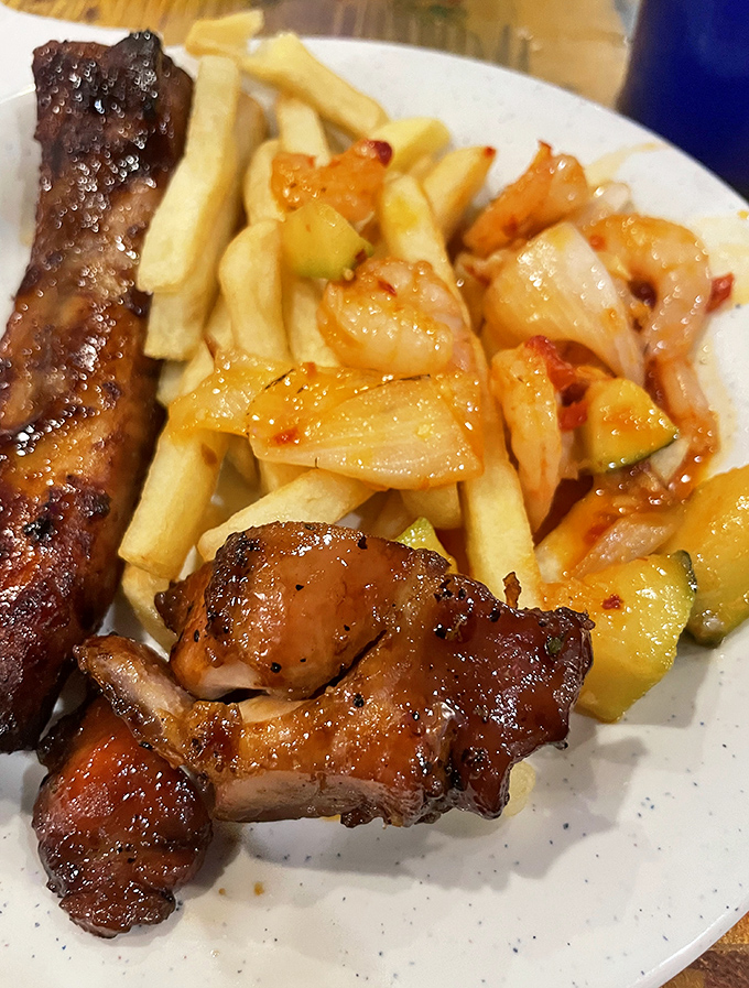 French fries fraternizing with stir-fry? At King Buffet, culinary borders dissolve in the most delicious diplomatic relations.