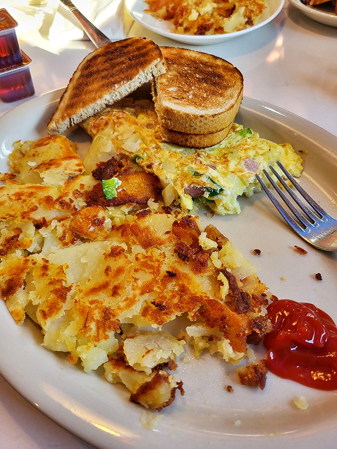 A breakfast plate that answers the eternal question: "Why choose between toast, eggs, and potatoes when you can have it all?"
