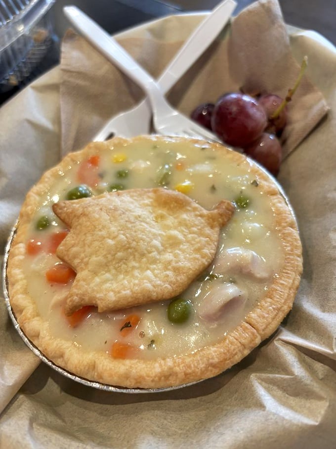 Chicken pot pie that would make your grandmother both proud and jealous &ndash; golden crust, creamy filling, and that adorable little pastry leaf on top!