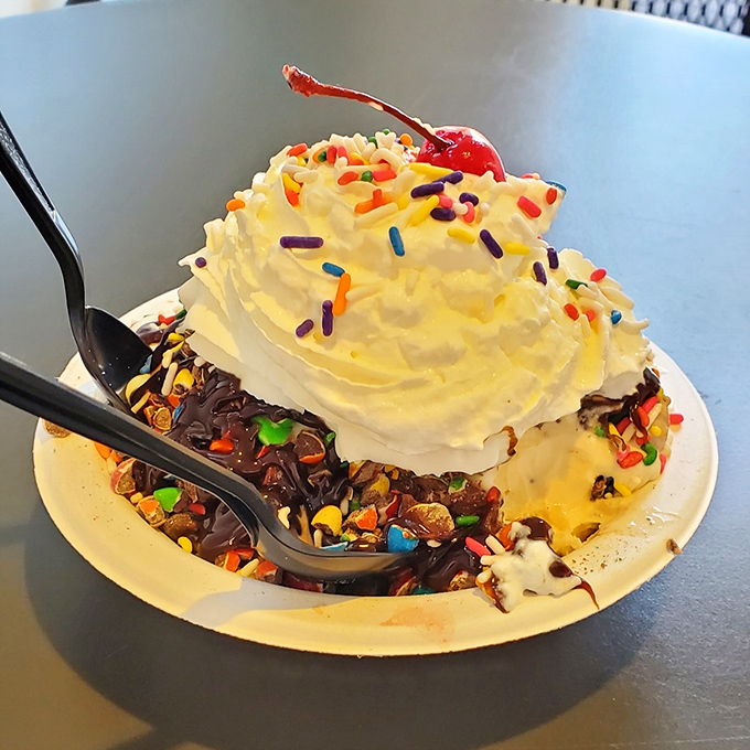 This sundae isn't just dessert&mdash;it's performance art. The sprinkles add that perfect touch of whimsy, like confetti at a celebration of flavor.