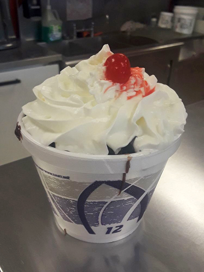 Whipped cream mountain with cherry summit. The expedition to the bottom of this cup will be the most delicious journey you'll ever take.