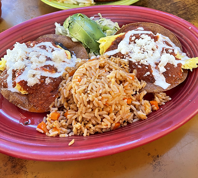 Huevos Rancheros that respect tradition while satisfying modern appetites. The rice alone deserves its own fan club and membership card.