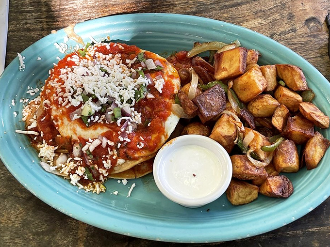 Huevos Rancheros that deliver a fiesta on a plate, with vibrant ranchero sauce and perfectly crisp potatoes that deserve their own fan club.