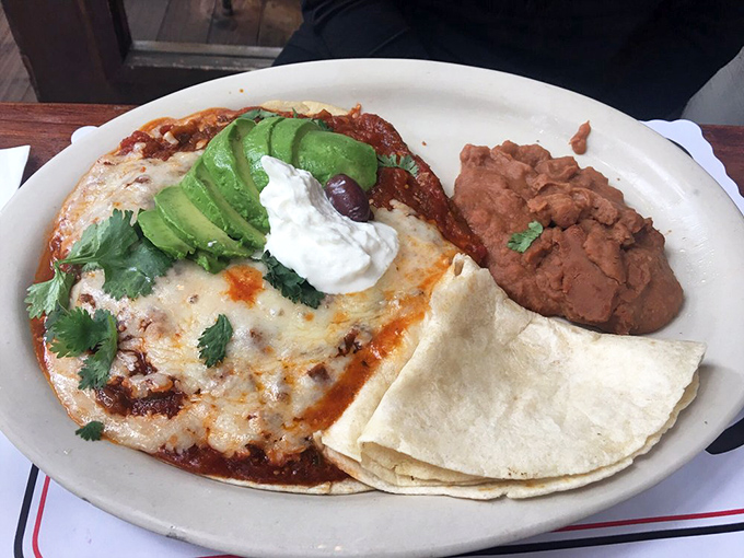 Huevos rancheros that would make your abuela proud &ndash; a fiesta of flavors topped with avocado slices that California practically requires by law.