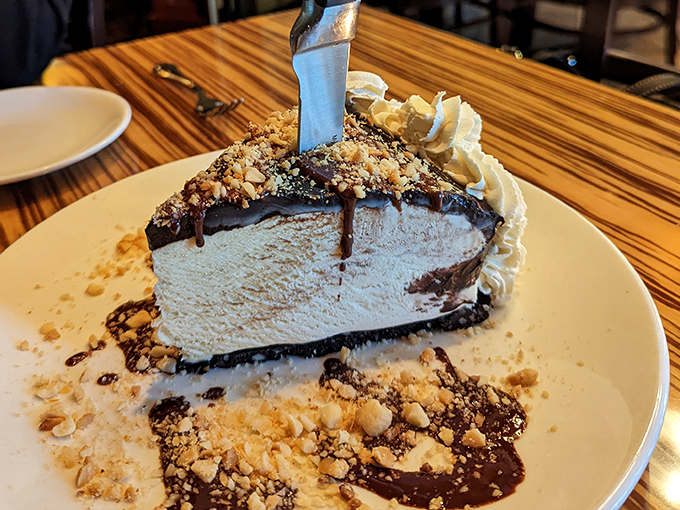 A slice of heaven that requires a knife! This towering dessert has more layers than your favorite drama series and twice the satisfaction.
