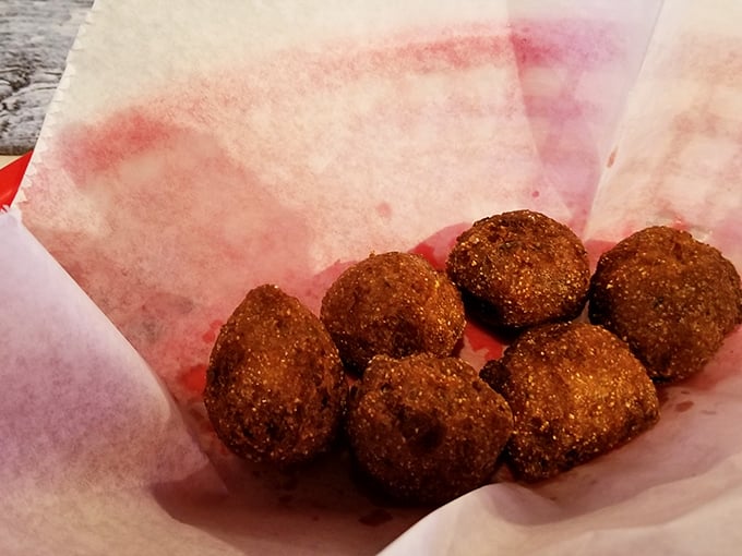 Hush puppies so perfectly golden they should be in a museum&mdash;if museums allowed visitors to devour the exhibits with honey butter.