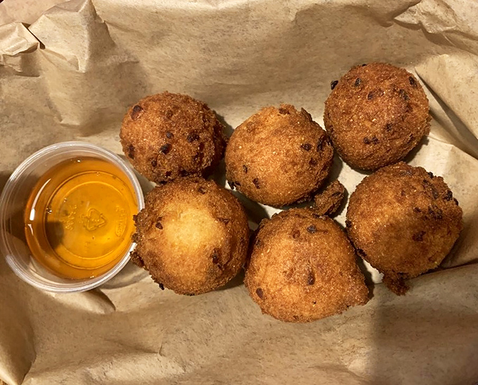 Hushpuppies: little orbs of cornmeal joy that make you wonder why you don't eat them every day. Honey makes everything better.