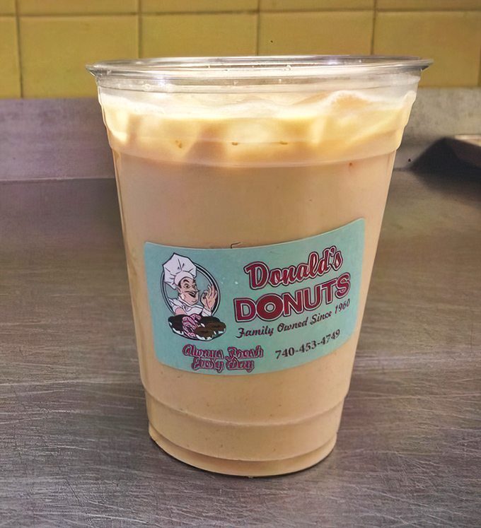 Coffee that's dressed for success. This isn't just a caffeine delivery system &ndash; it's the perfect dance partner for your donut, complete with a fancy outfit and Donald's signature charm.