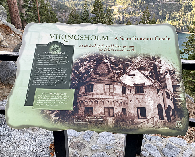 History lesson with a view. This informational plaque offers fascinating insights about Vikingsholm while you catch your breath from that hike down.