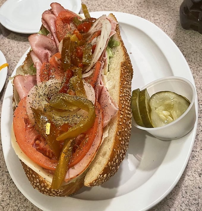A proper Italian hoagie should require both hands and several napkins. This beauty, loaded with meats, veggies, and hot peppers, delivers on that promise.