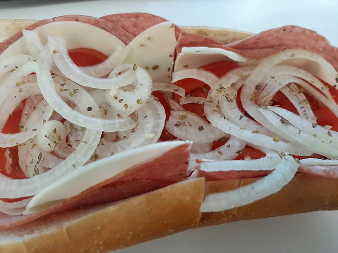 This isn't just a sandwich—it's an architectural marvel of meat, cheese, and veggies that demands to be admired before eaten.