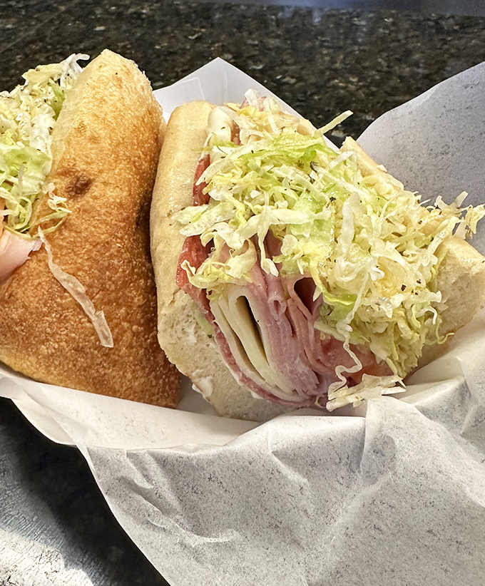 The Italian sub that makes other sandwiches feel inadequate. That mountain of shredded lettuce isn't just garnish—it's commitment to the craft.