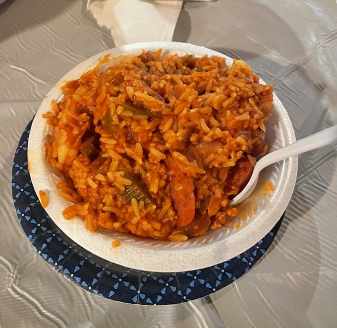 Jambalaya that's redder than a tourist after a day at the beach. Each spoonful tells a story of Louisiana tradition with a Florida accent.