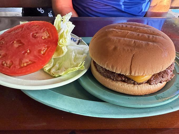 In a world of pretentious sliders and deconstructed sandwiches, this cheeseburger stands as a monument to straightforward satisfaction.