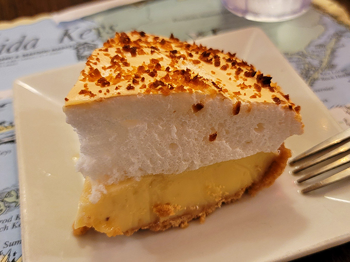 Key Lime Pie with a toasted meringue top that's the perfect finale to a seafood symphony. Florida sunshine in dessert form.