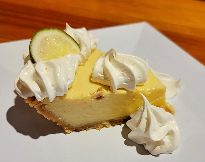 Key lime pie so authentic it should come with its own Florida citizenship papers. That creamy-tart balance is the stuff of dessert dreams.