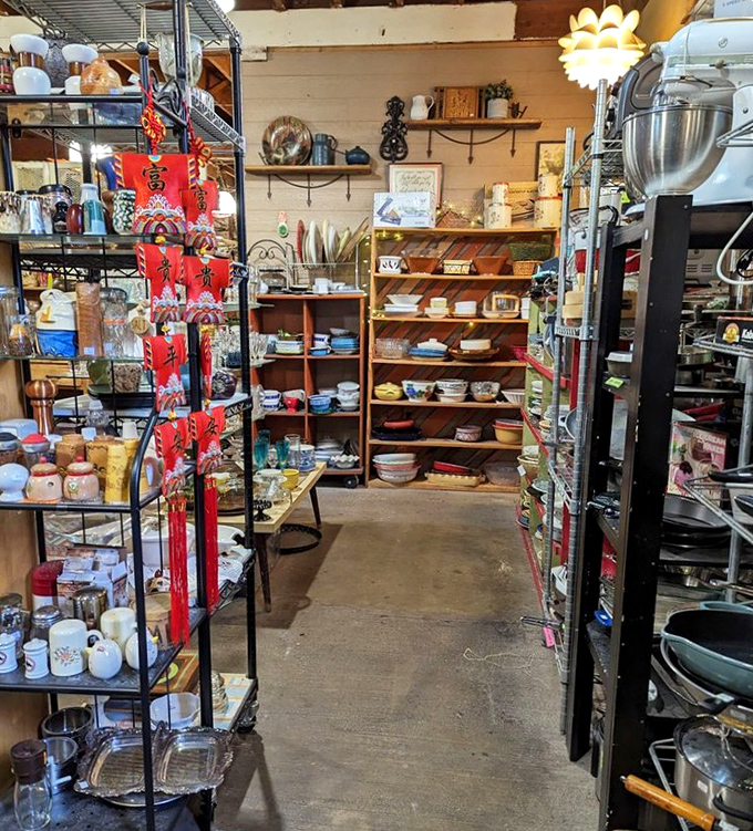Kitchen implements from every era create a cook's history museum. That orange teapot is practically begging to come home with someone.