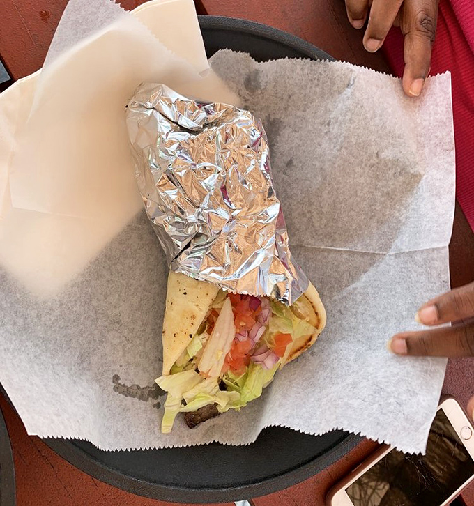 Wrapped perfection: fresh veggies, tender meat, and a hint of Mediterranean flair in the heart of Florida. Geography never tasted so good.